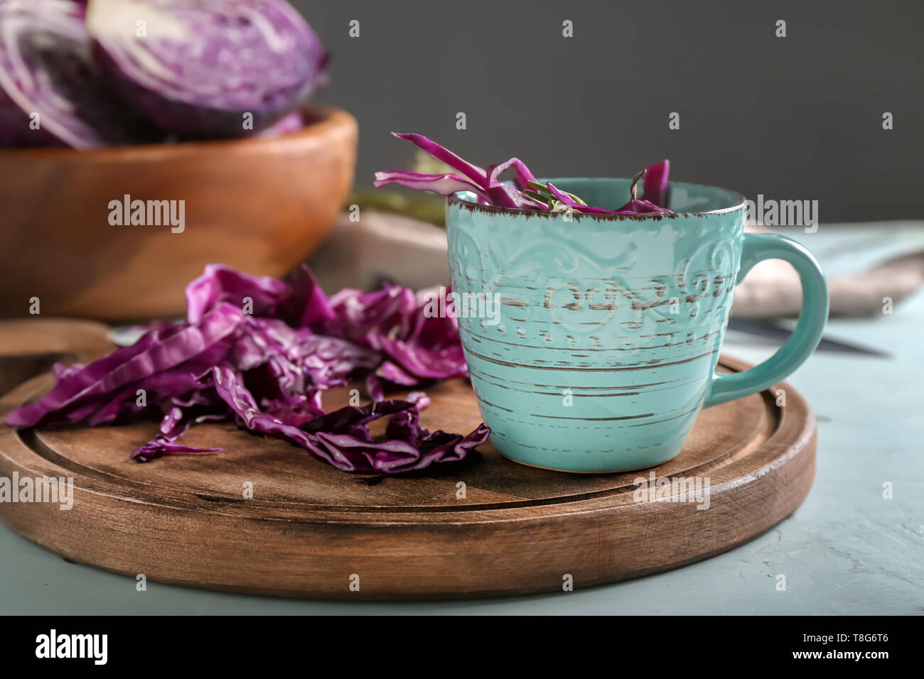 Cup with cut red cabbage on board, closeup Stock Photo - Alamy