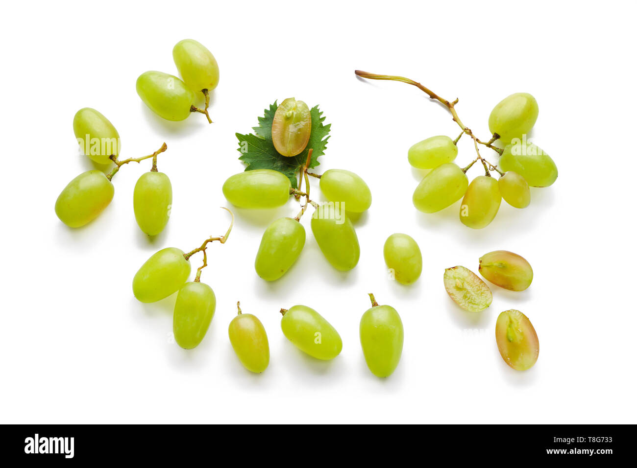Fresh ripe grapes on white background Stock Photo - Alamy