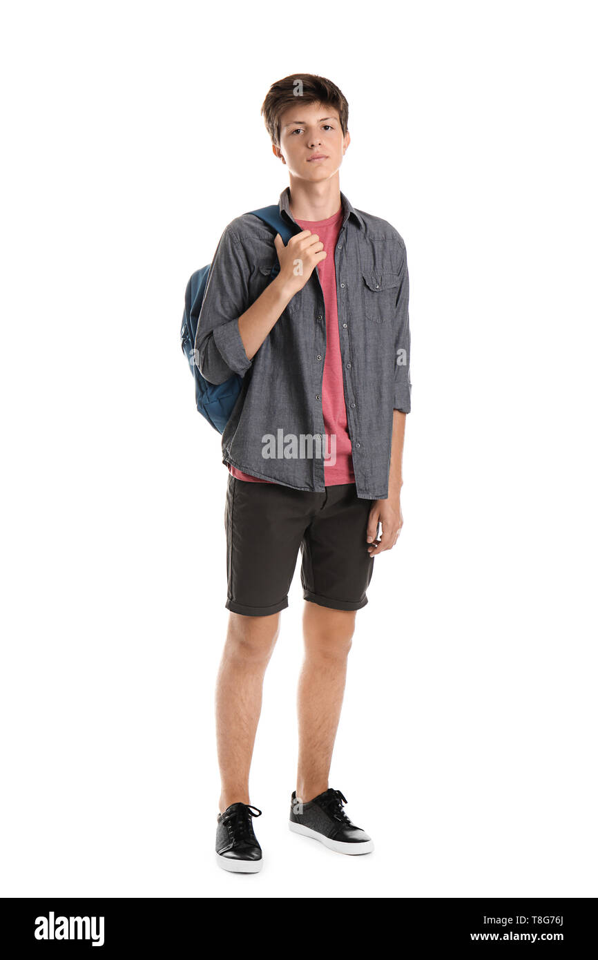Teenage boy with backpack on white background Stock Photo - Alamy