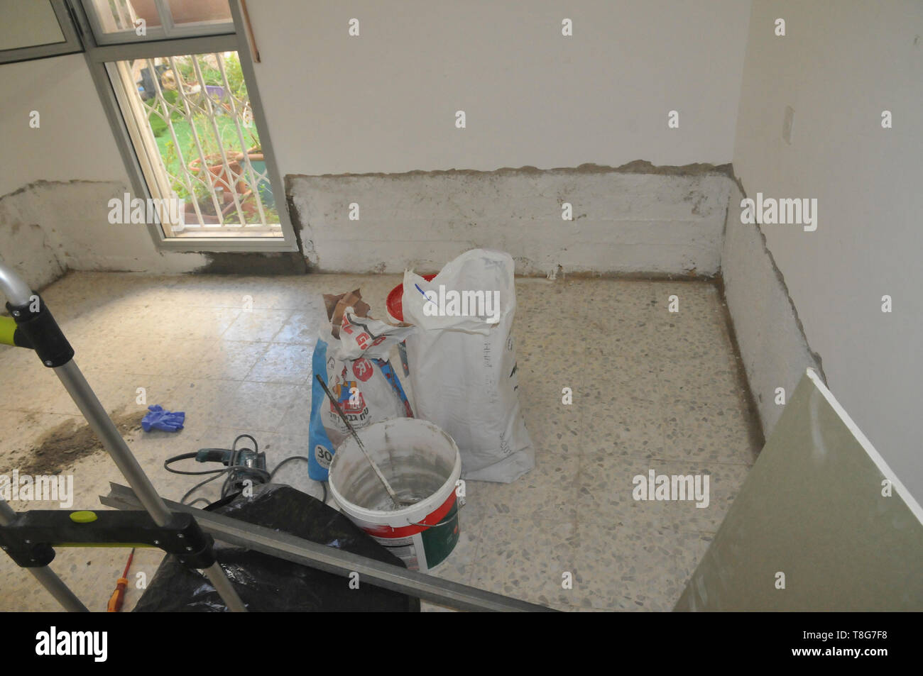 Home care. a room is being re plastered and is ready for painting. The ...