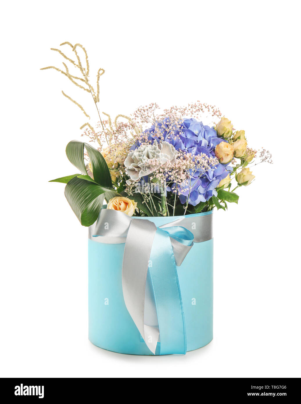 Gift box with beautiful flowers on white background Stock Photo - Alamy
