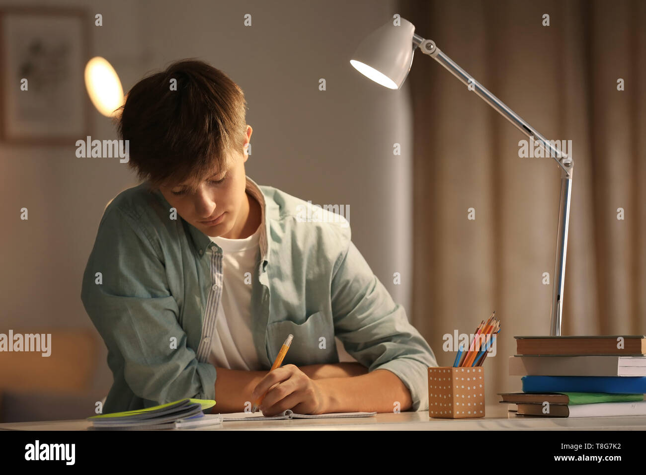 Boy homework lamp hi-res stock photography and images - Alamy