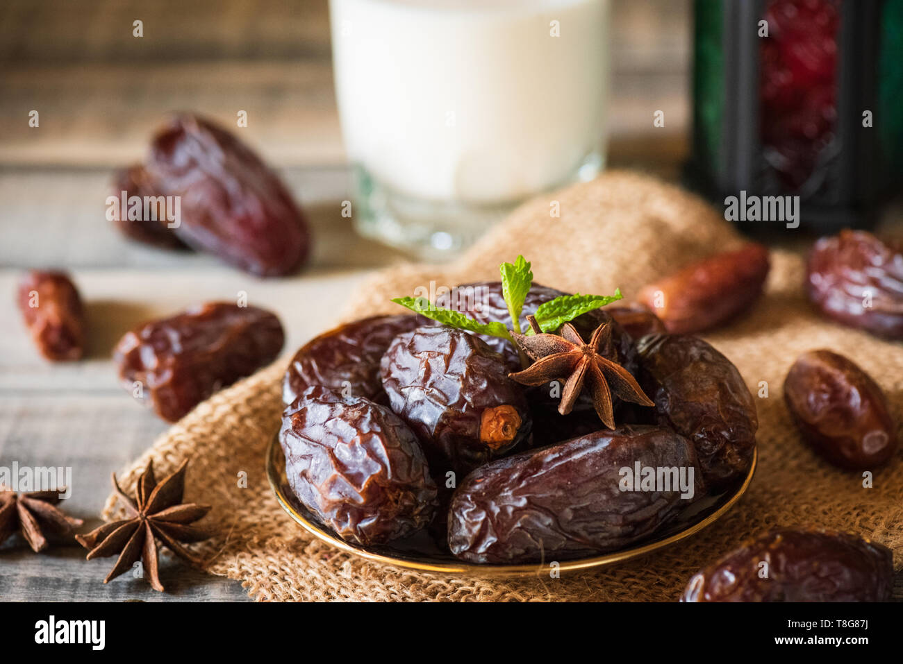 Ramadan food and drinks concept. Ramadan Lantern with Milk, dates fruit ...