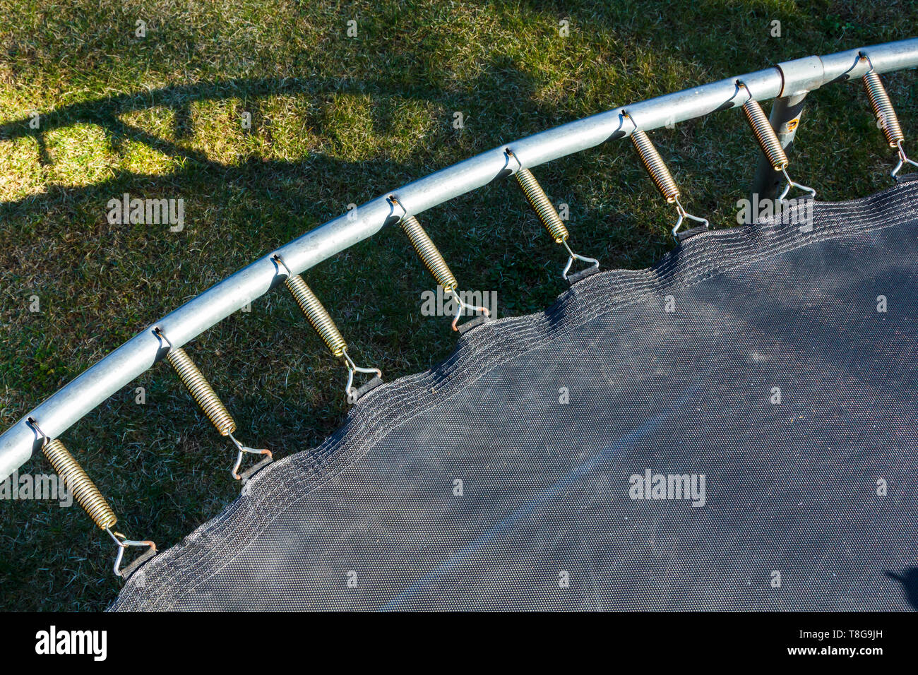 springs attached to the trampoline frame, activity background Stock ...