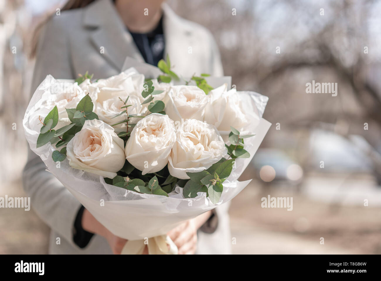 Mono bouquet of garden roses. Delicate bouquet of mixed flowers in ...