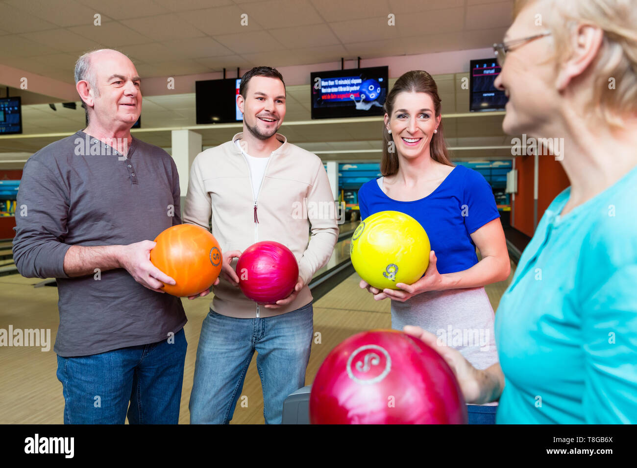 Family enjoying indoor games Stock Photo - Alamy