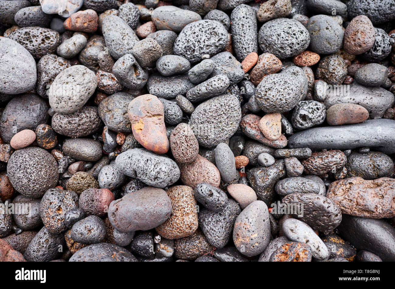 Natural background made of pebbles and volcanic rocks Stock Photo - Alamy