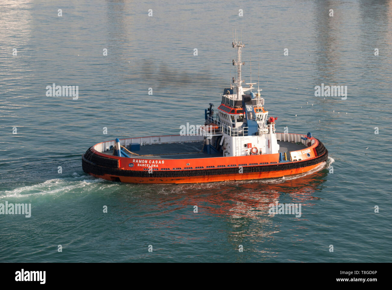 Tug boat Ramon Casas sailing in the waters of the port of Barcelona ...