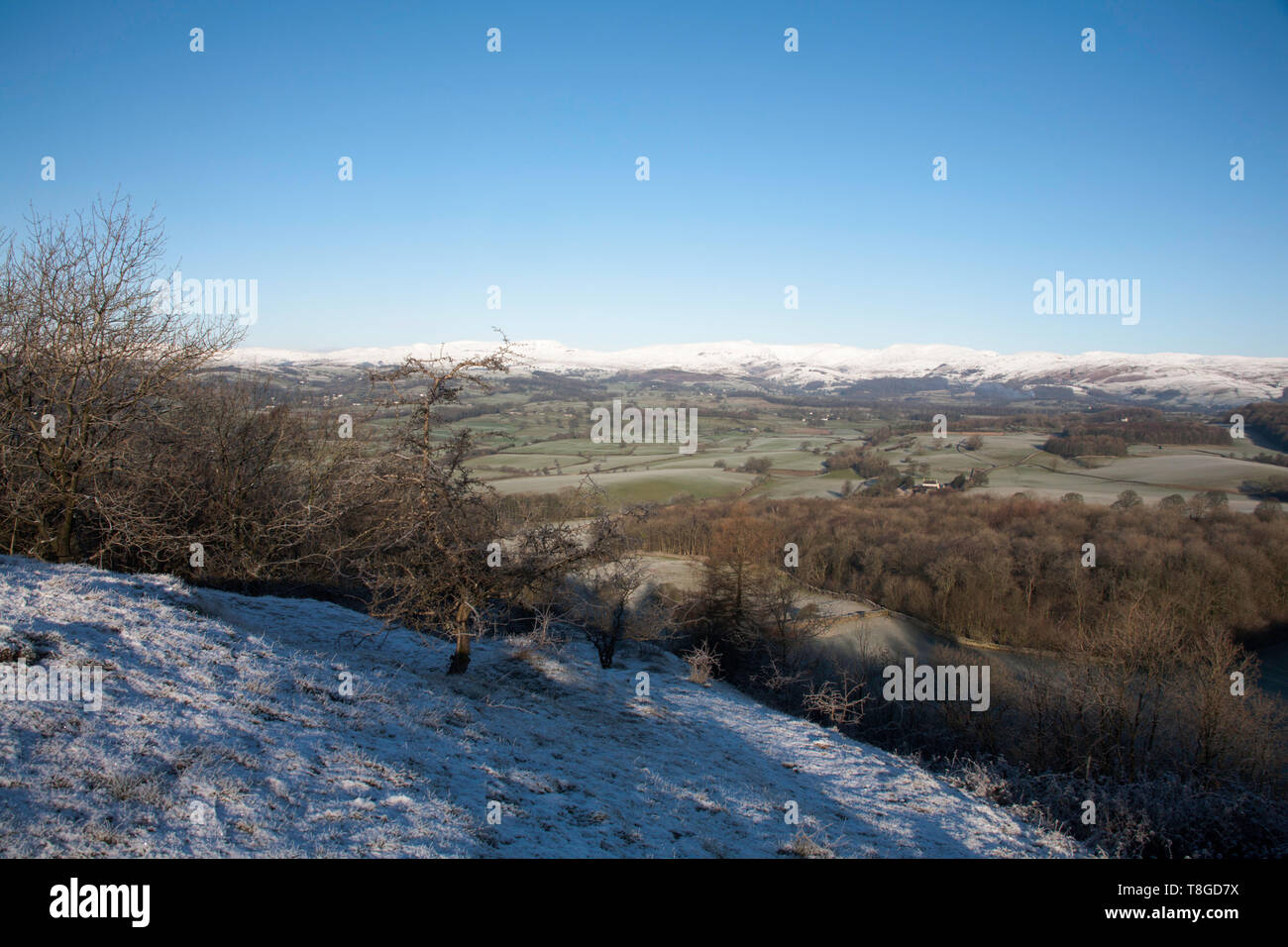 Snow covered Lakeland hills a frosty bright winter morning taken from ...
