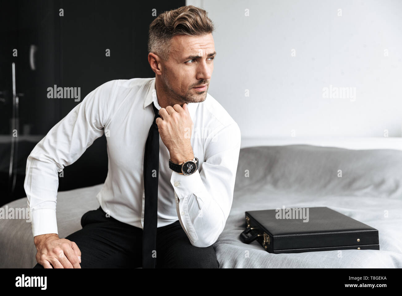 Man in bedroom hi-res stock photography and images - Alamy