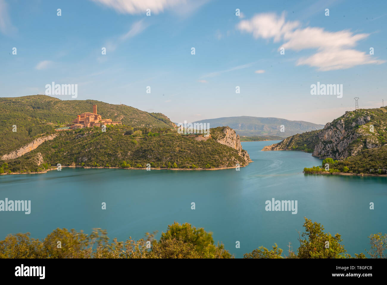 View of the Shrine of Torreciudad from El Grado dam, Aragon, Spain ...