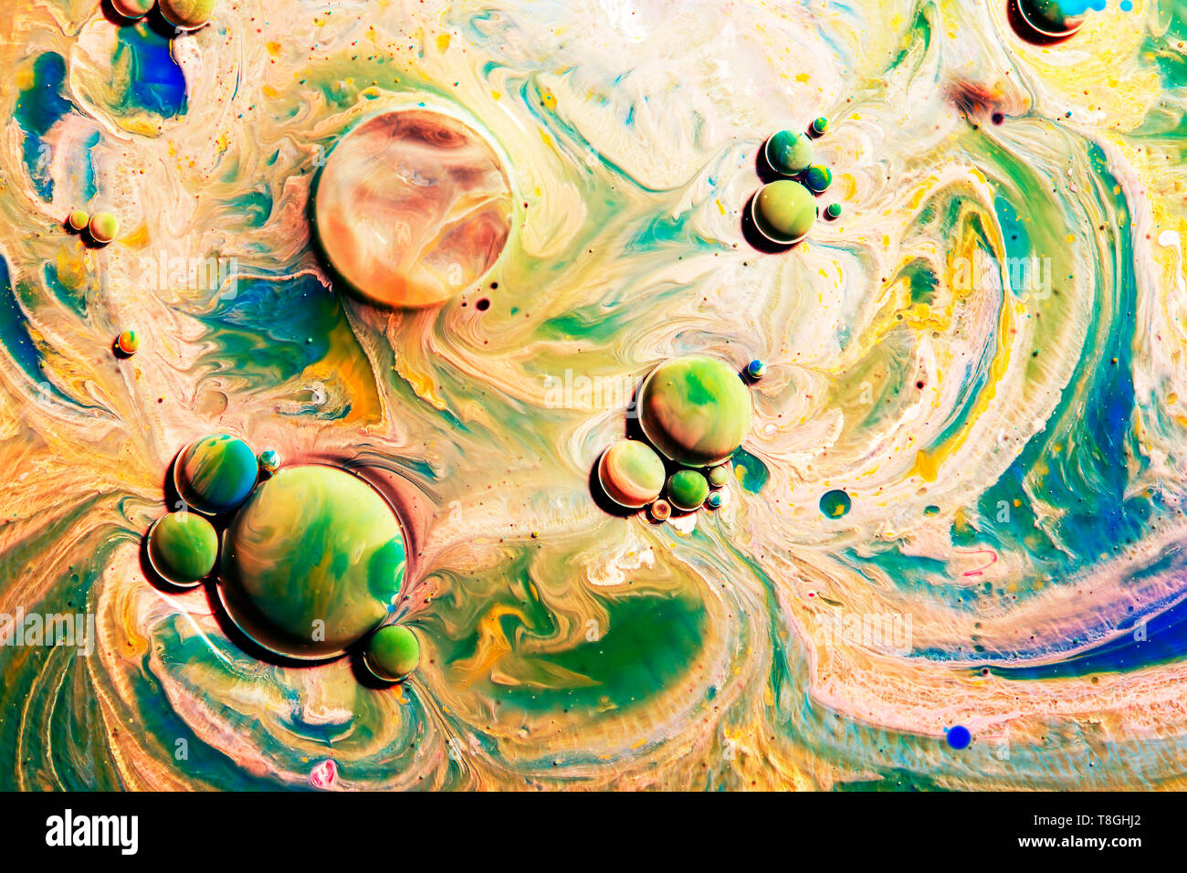 Macro photography of colorful bubbles in some fluids producing vibrant ...