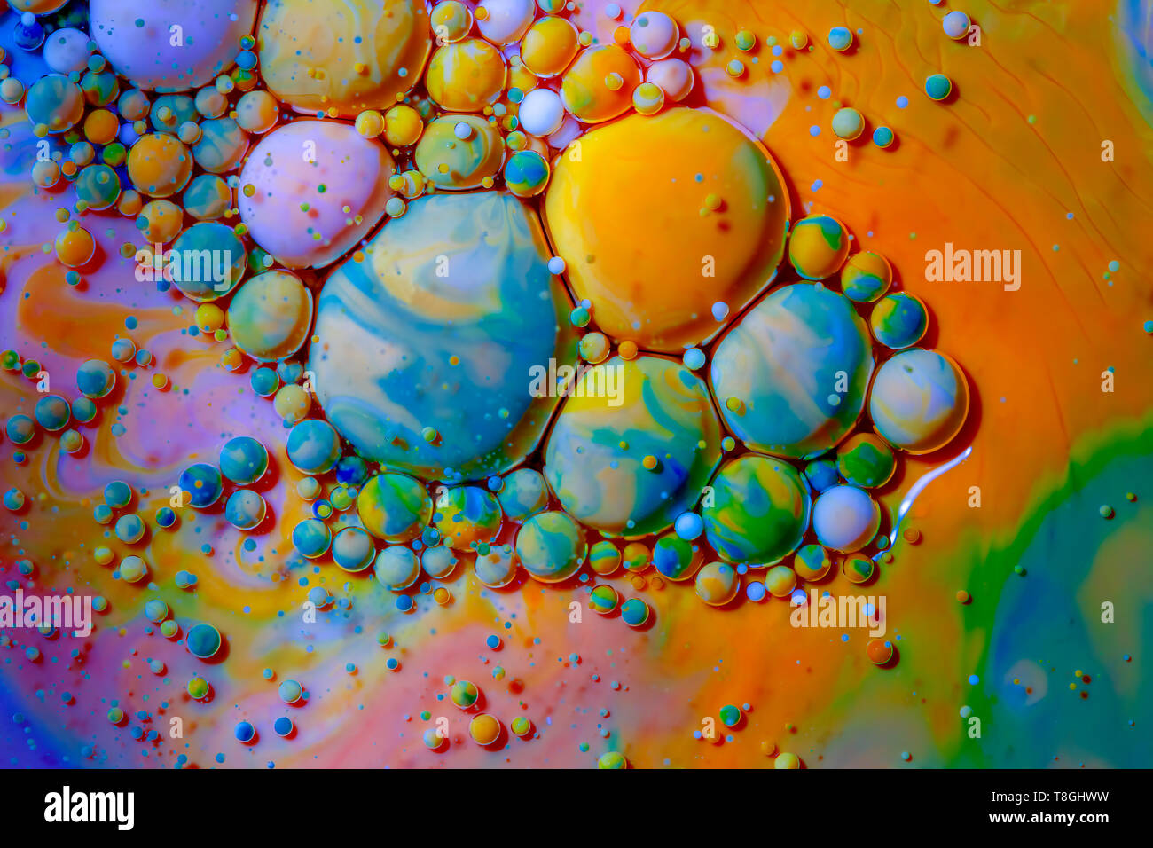 Macro photography of colorful bubbles in some fluids producing vibrant ...