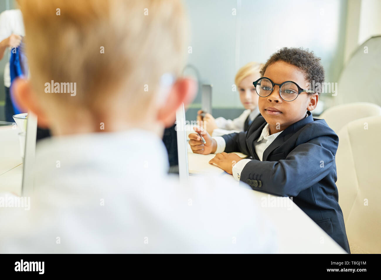 Children working together in classroom hi-res stock photography and ...