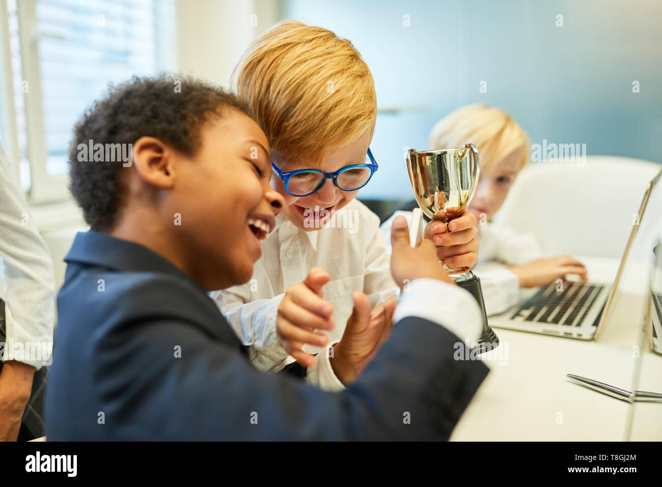 Children team winners hi-res stock photography and images - Alamy