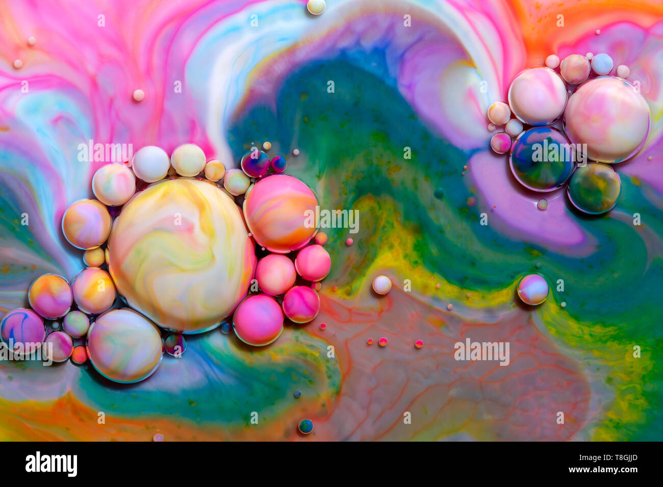 Macro photography of colorful bubbles in some fluids producing vibrant ...