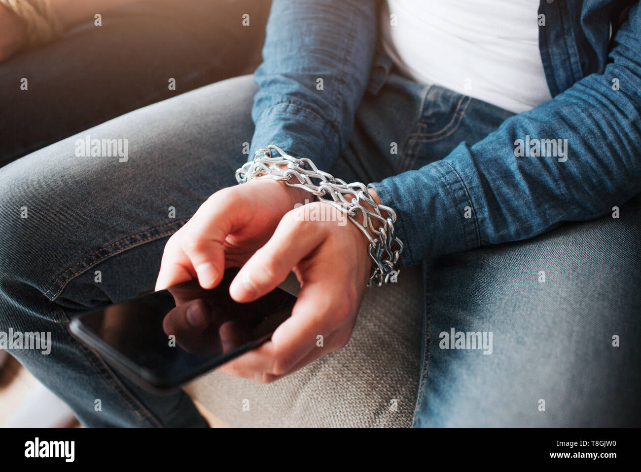 Wrist in chains hi-res stock photography and images - Alamy
