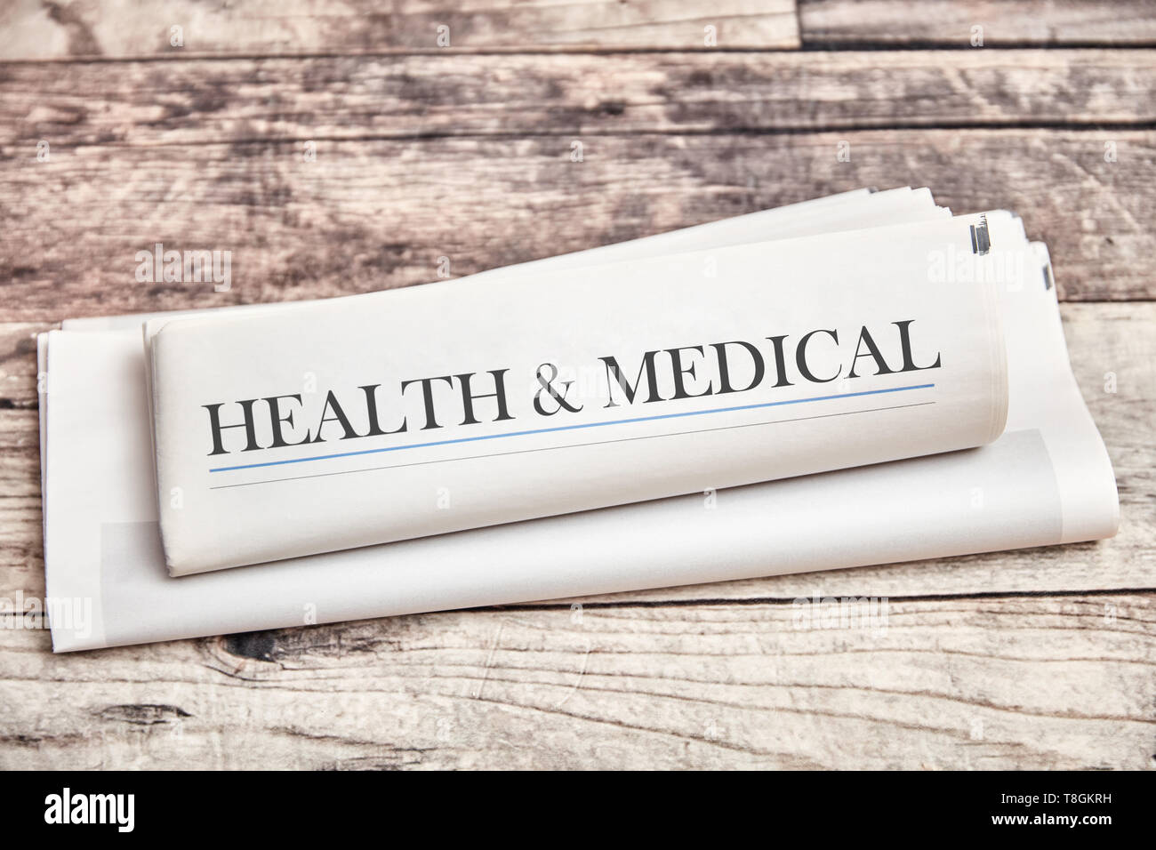 Health & Medical Newspaper for Healthcare News Stock Photo - Alamy