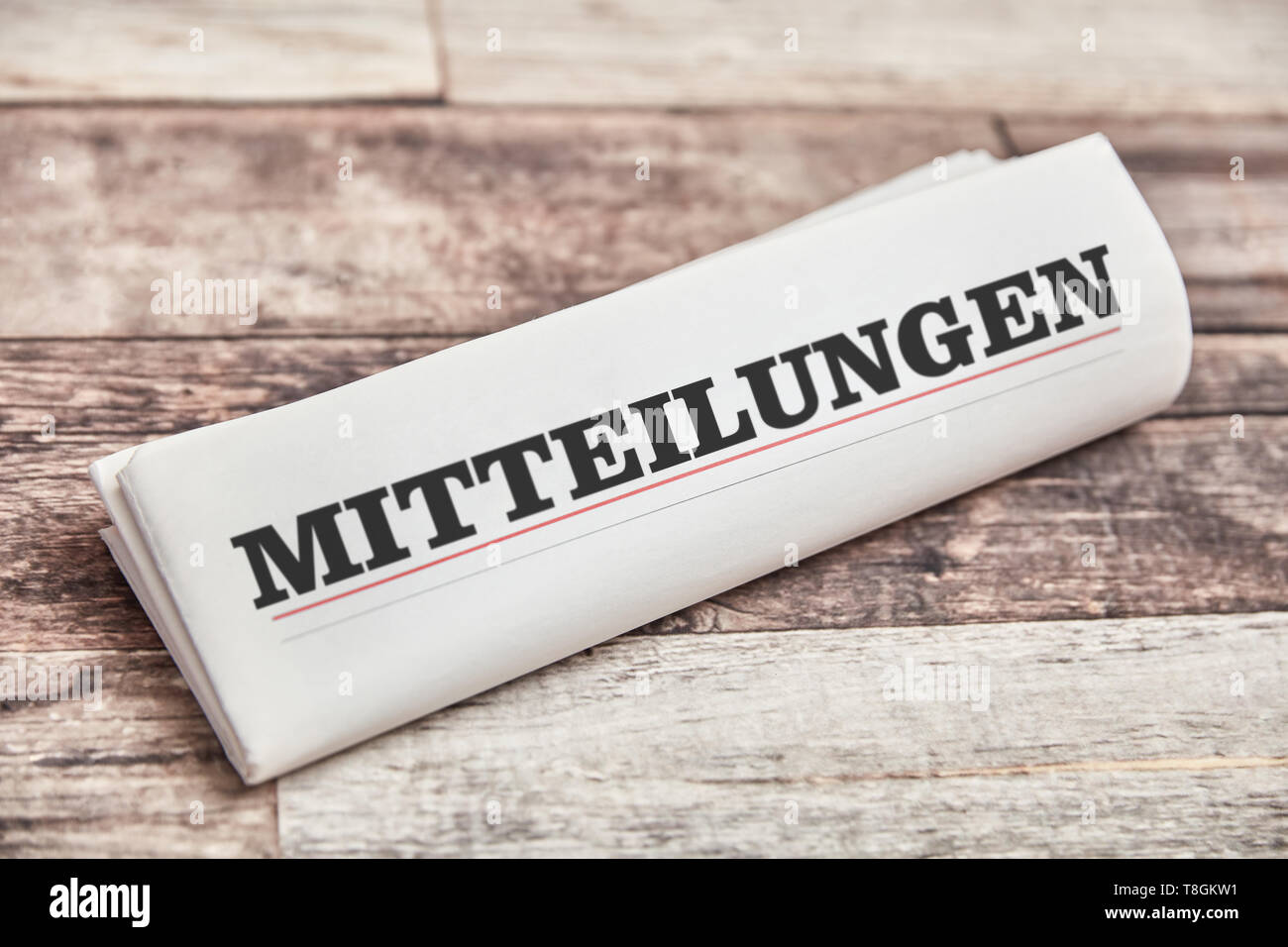 German word "Mitteilungen" (messages) in the title as a folded ...