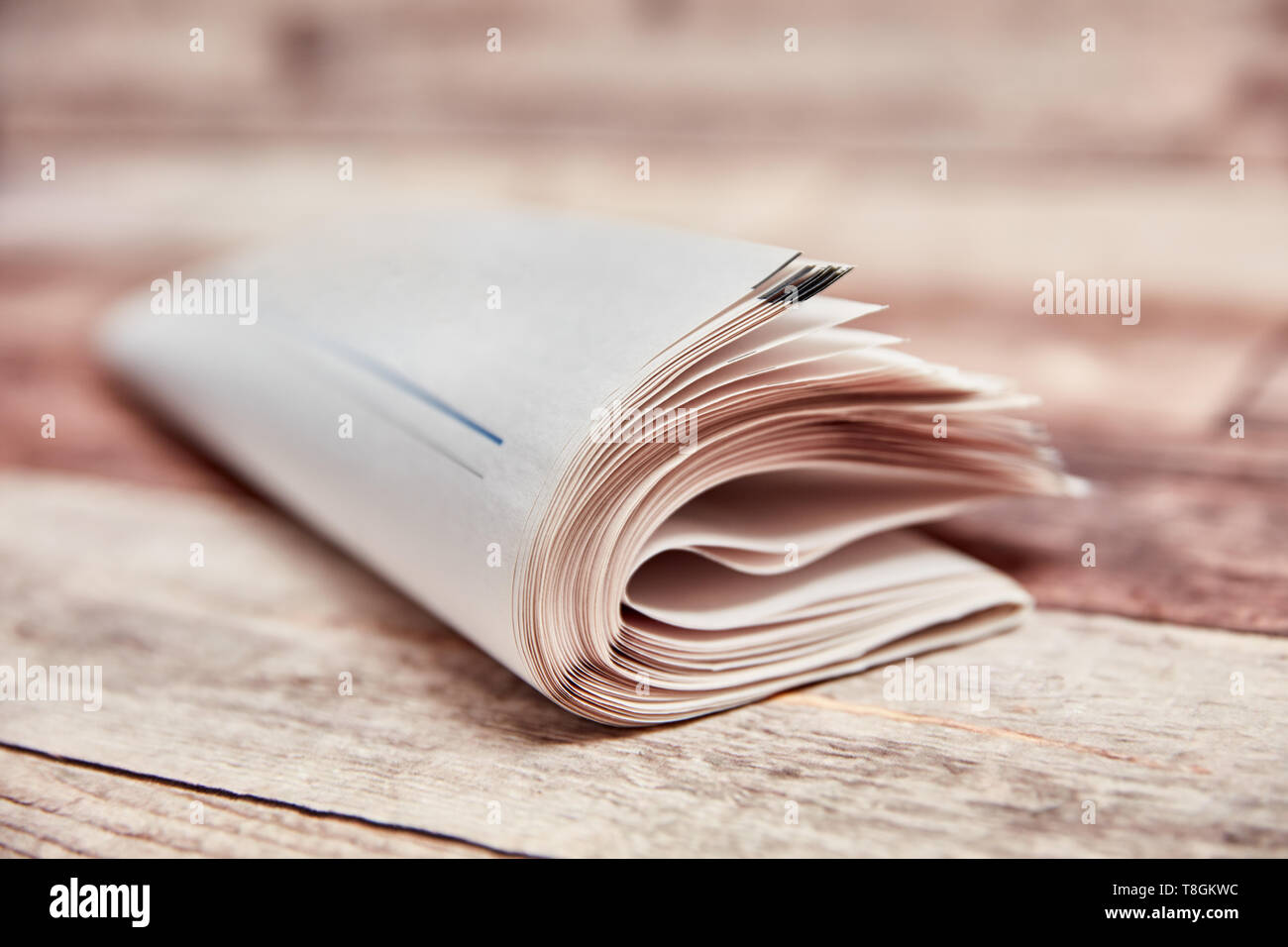 Open Newspaper On Table