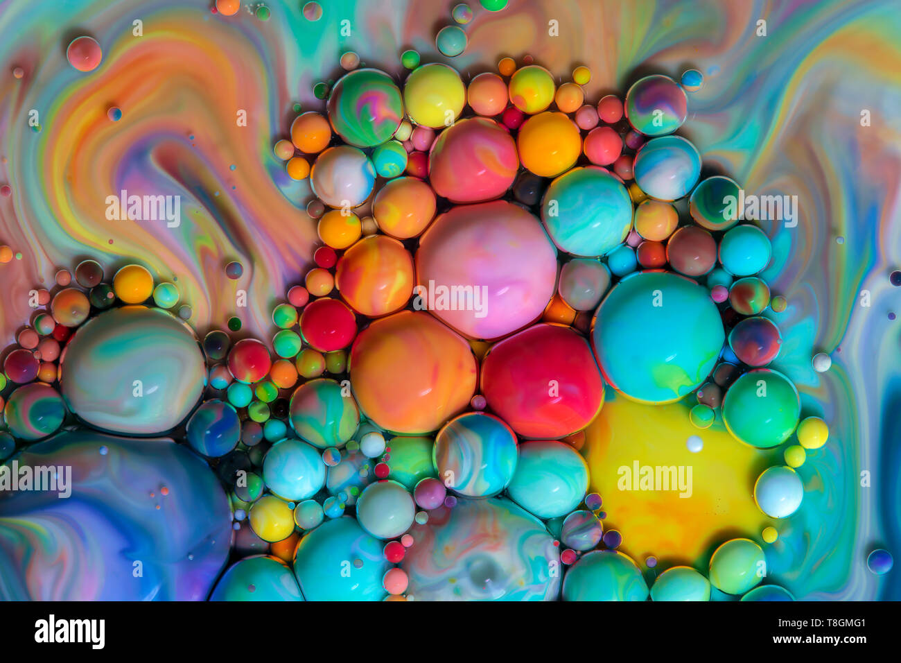 Macro photography of colorful bubbles in some fluids producing vibrant ...