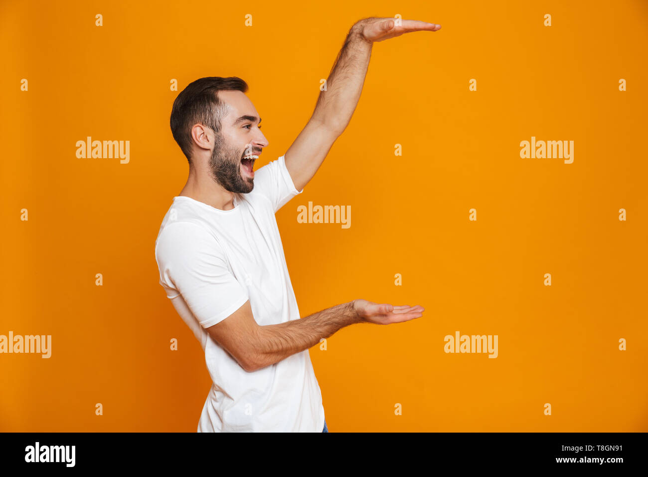 Image of european man 30s with beard and mustache showing copyspace ...