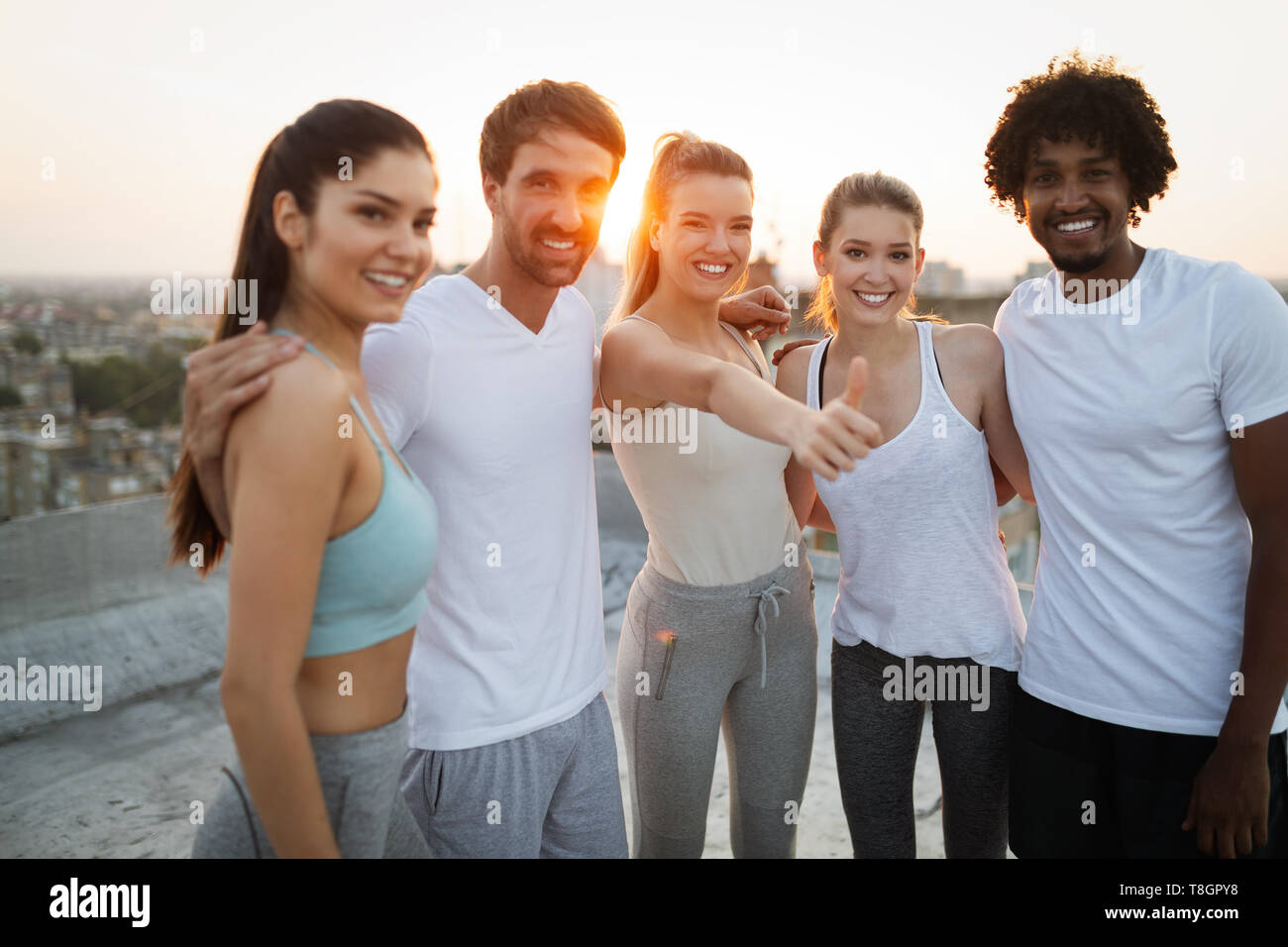 Fitness, sport, friendship and healthy lifestyle concept - group of ...