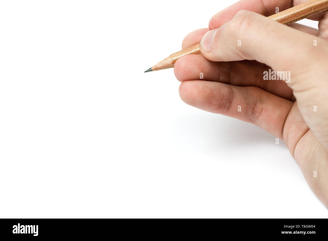 A hand writing with a pencil on blank white paper Stock Photo - Alamy