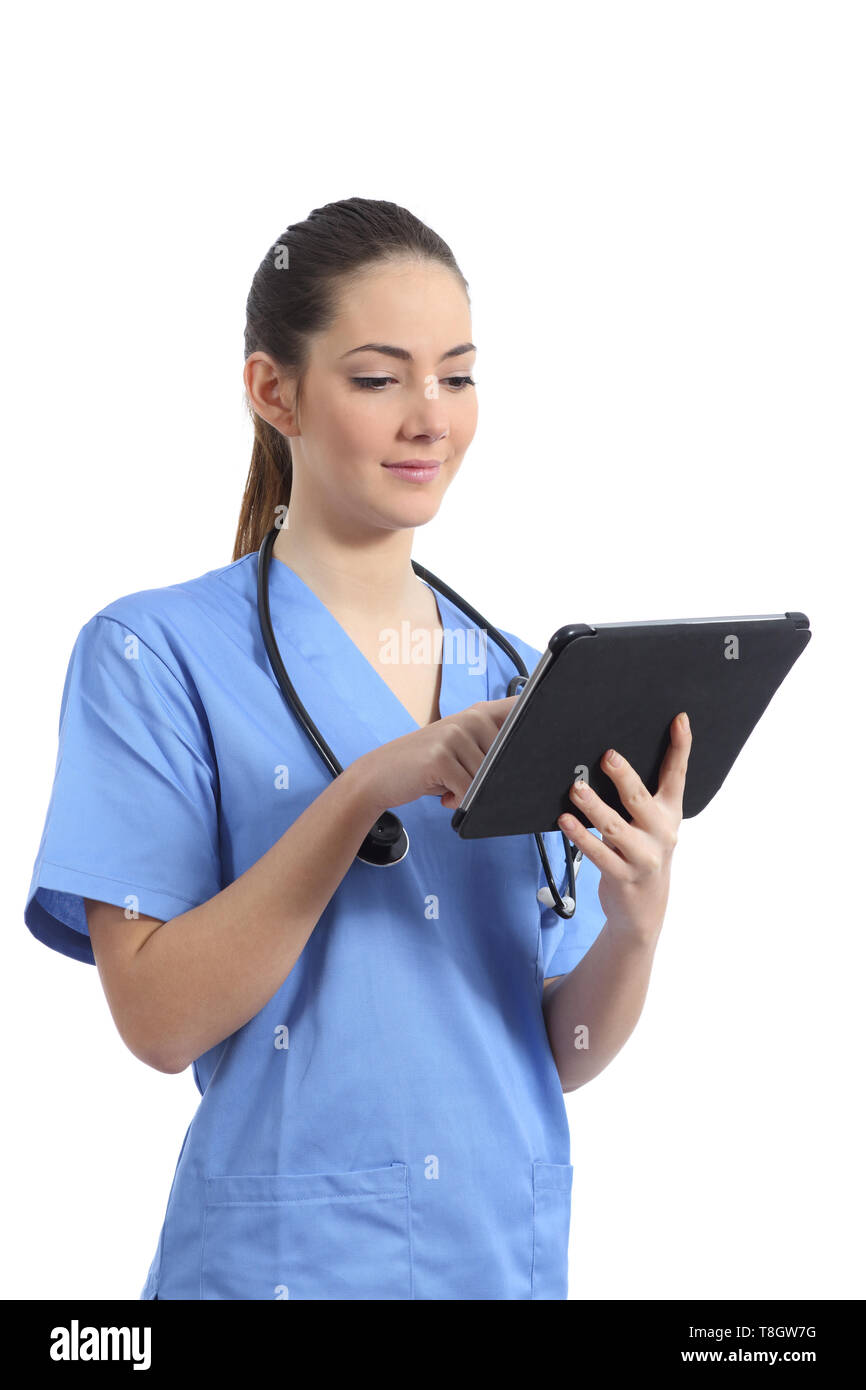 Serious nurse isolated on white background using a tablet Stock Photo ...
