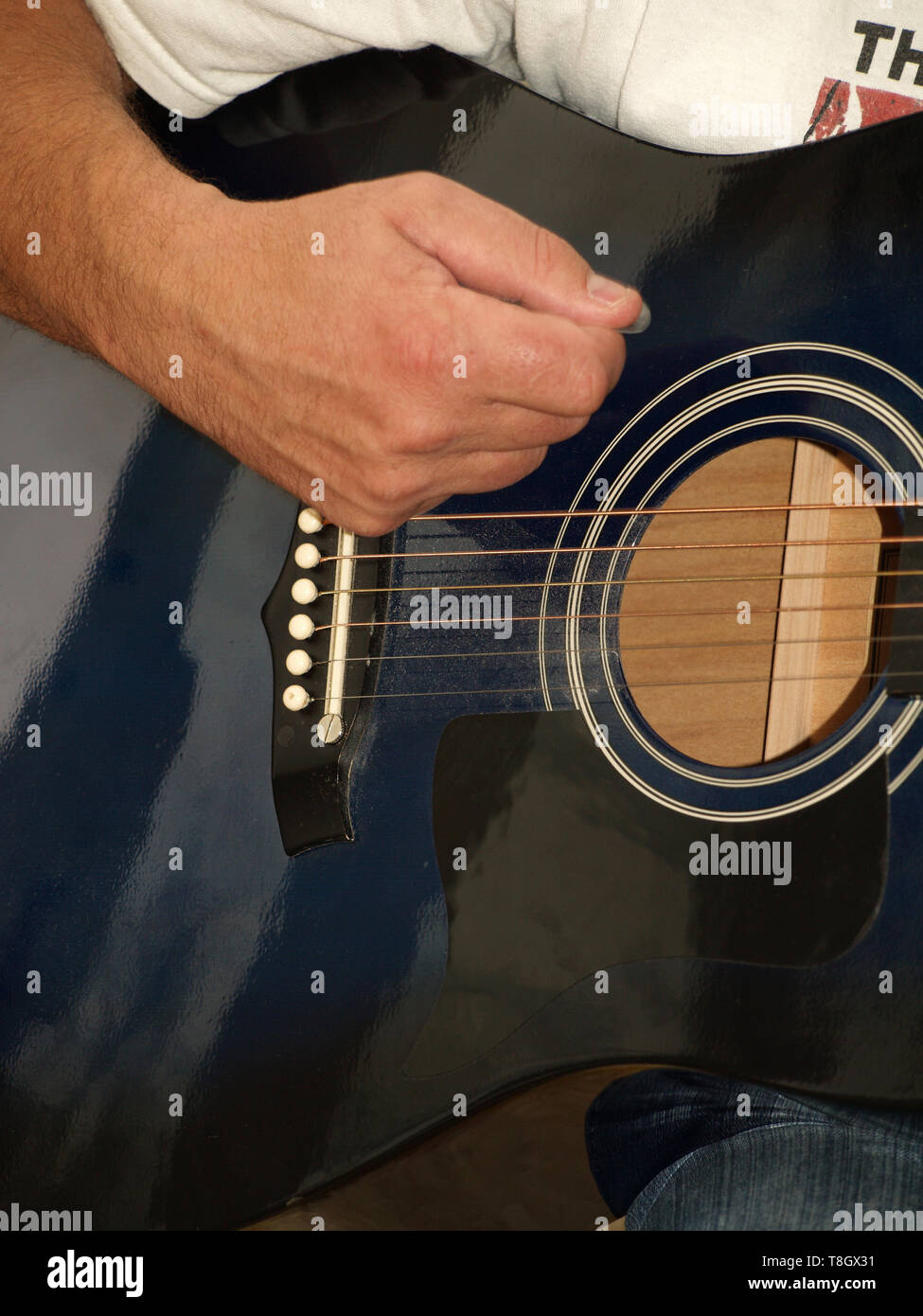 Playing six string electric bass guitar hi-res stock photography and ...