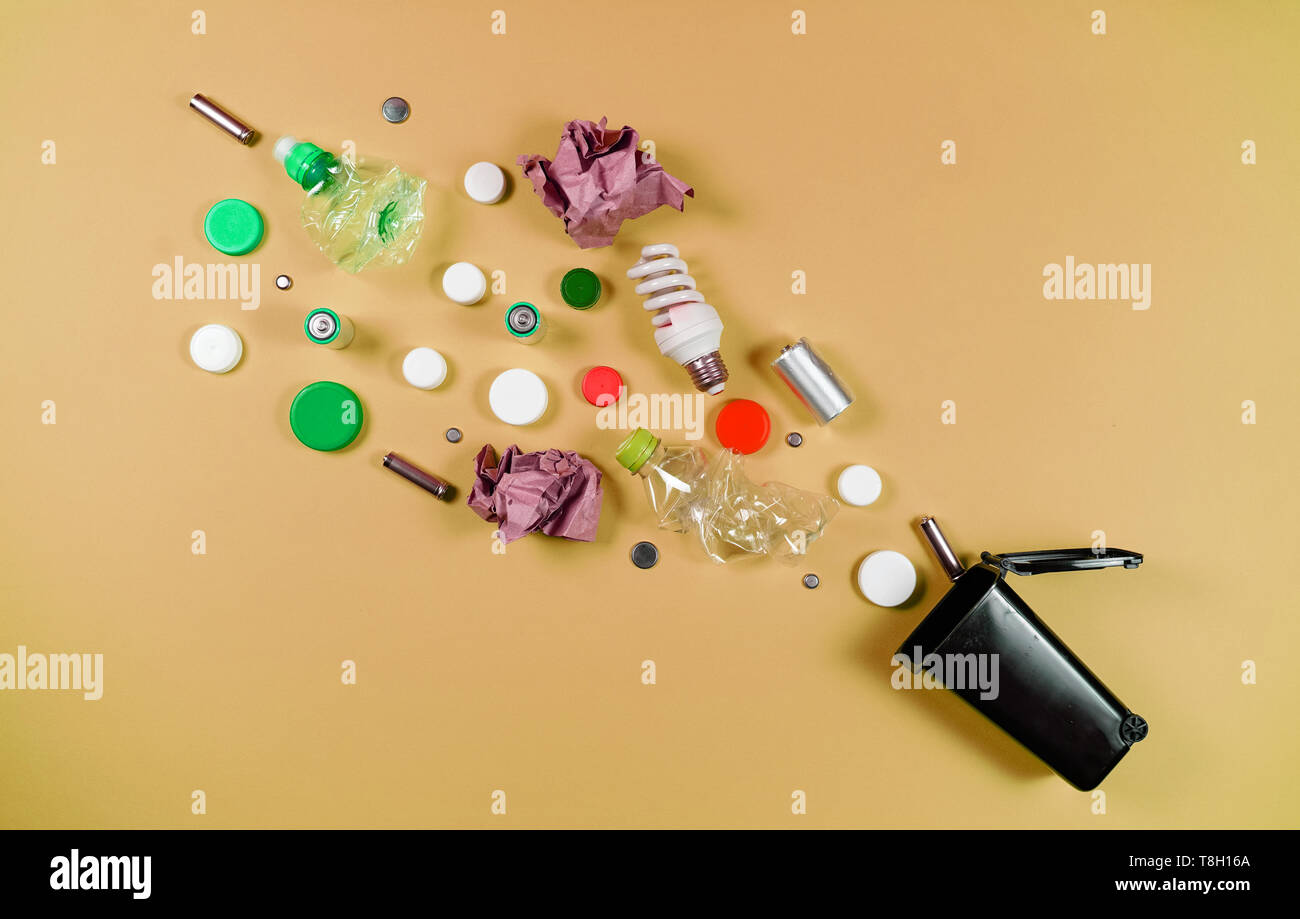 Trash bins and assorted garbage isolated on green, recycle concept, Top ...