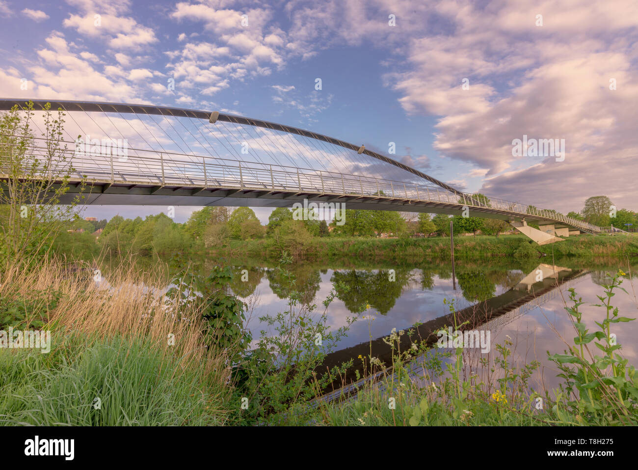 The Millennium Bridge in York. A modern designed steel suspension ...