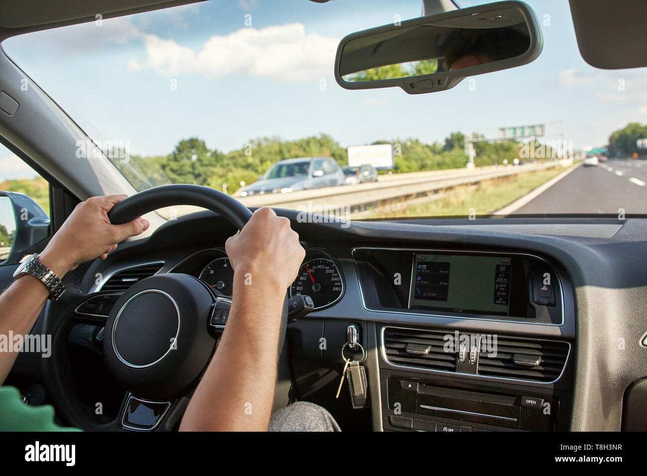 man driving a car. people traveling at the wheel Stock Photo - Alamy