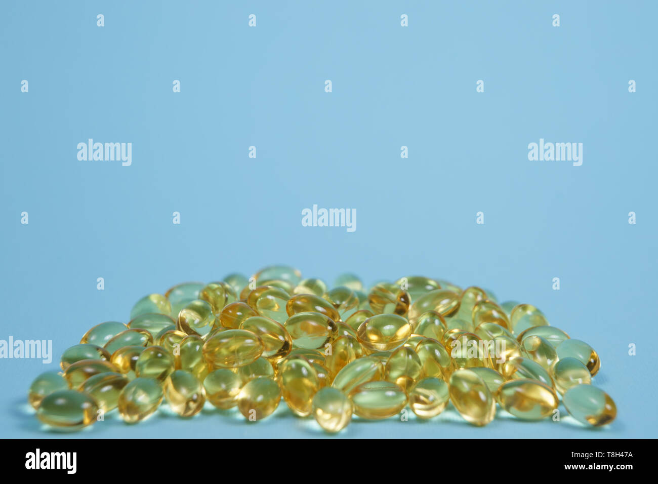 Capsules with fats for diet and healthy eating with a copy of space ...