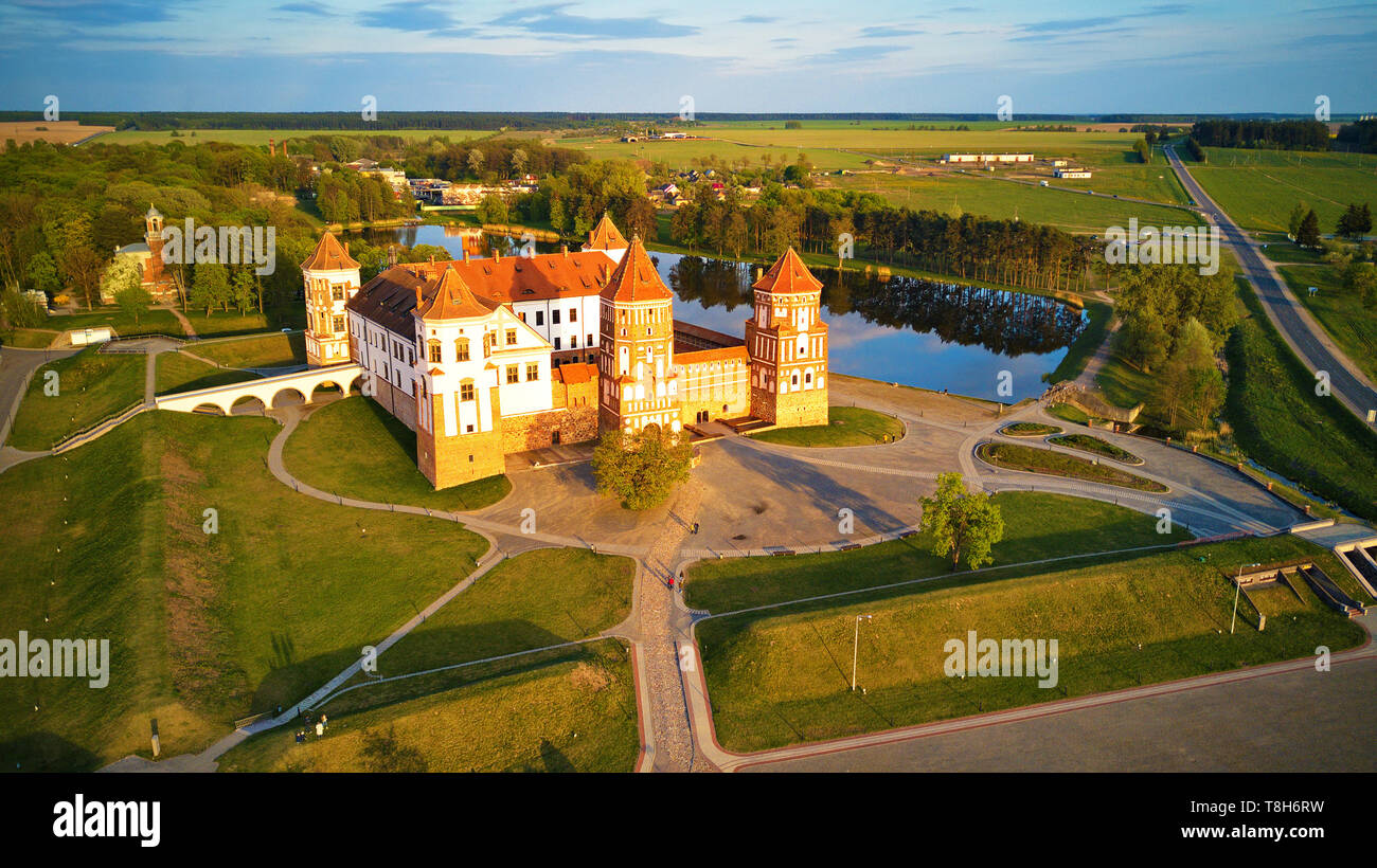 Aerial view of Medieval Mir castle complex on sunny spring day. Famous ...