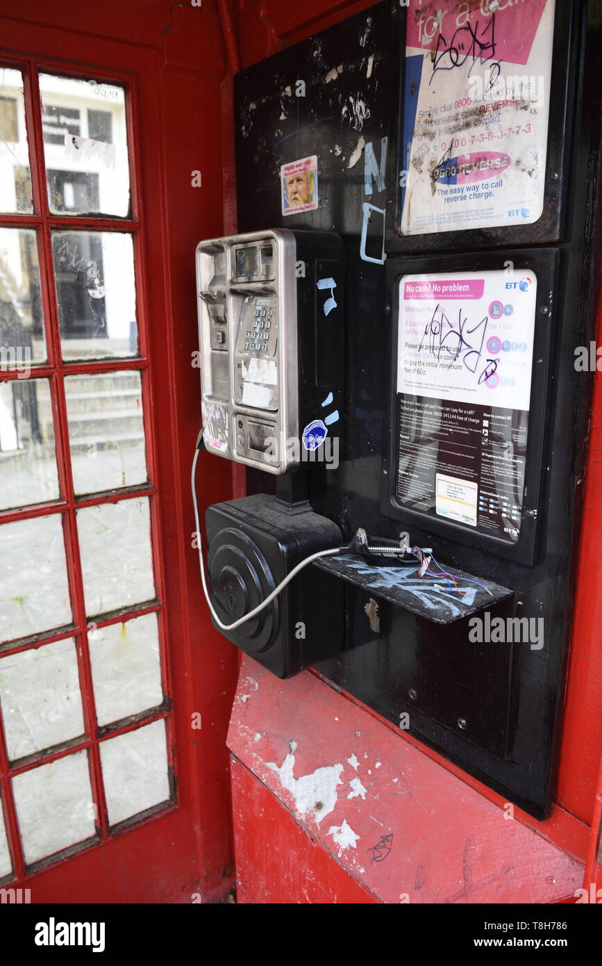 Broken phone box london hi-res stock photography and images - Alamy
