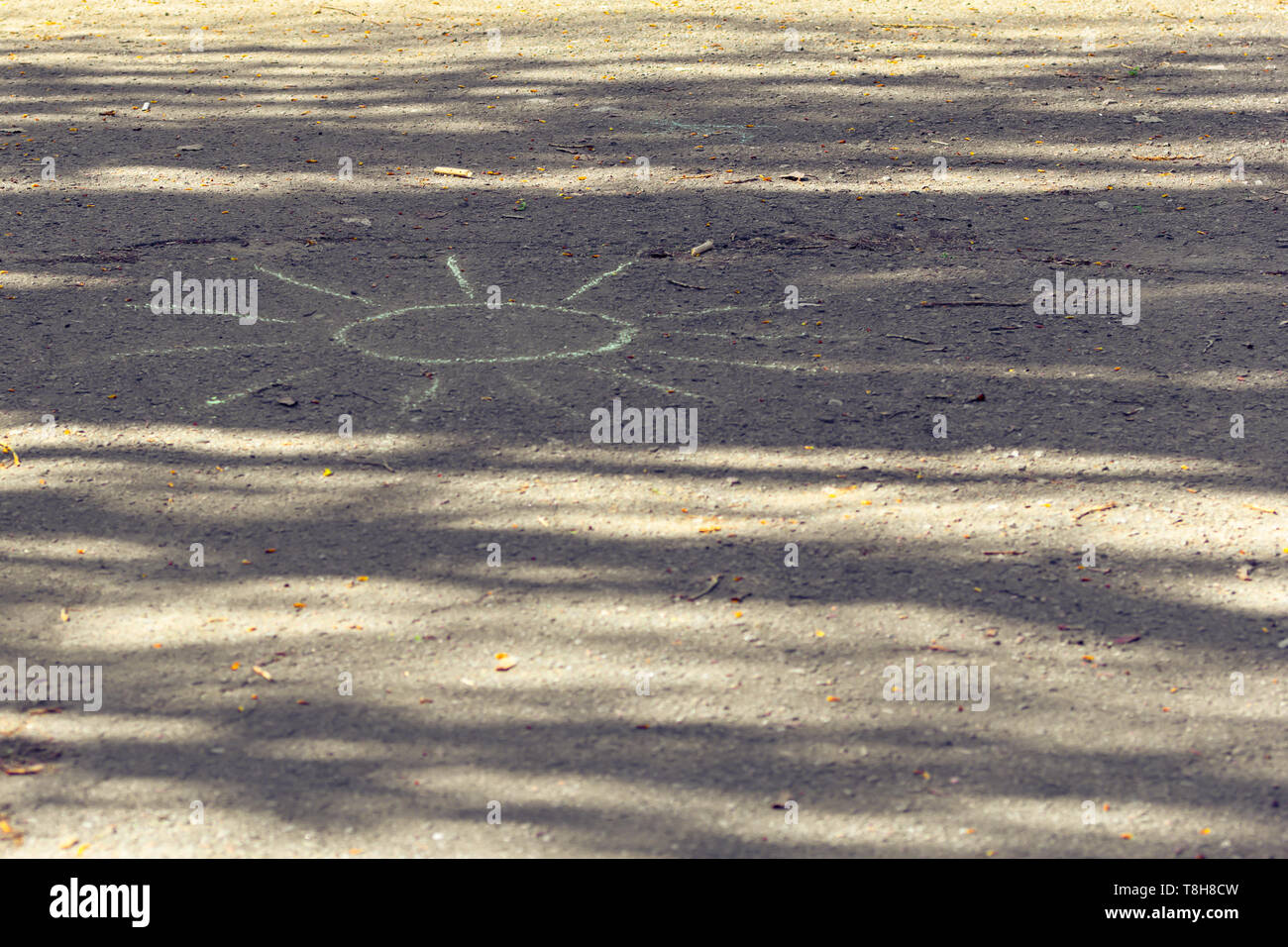 Painting with chalk on the asphalt hi-res stock photography and images ...