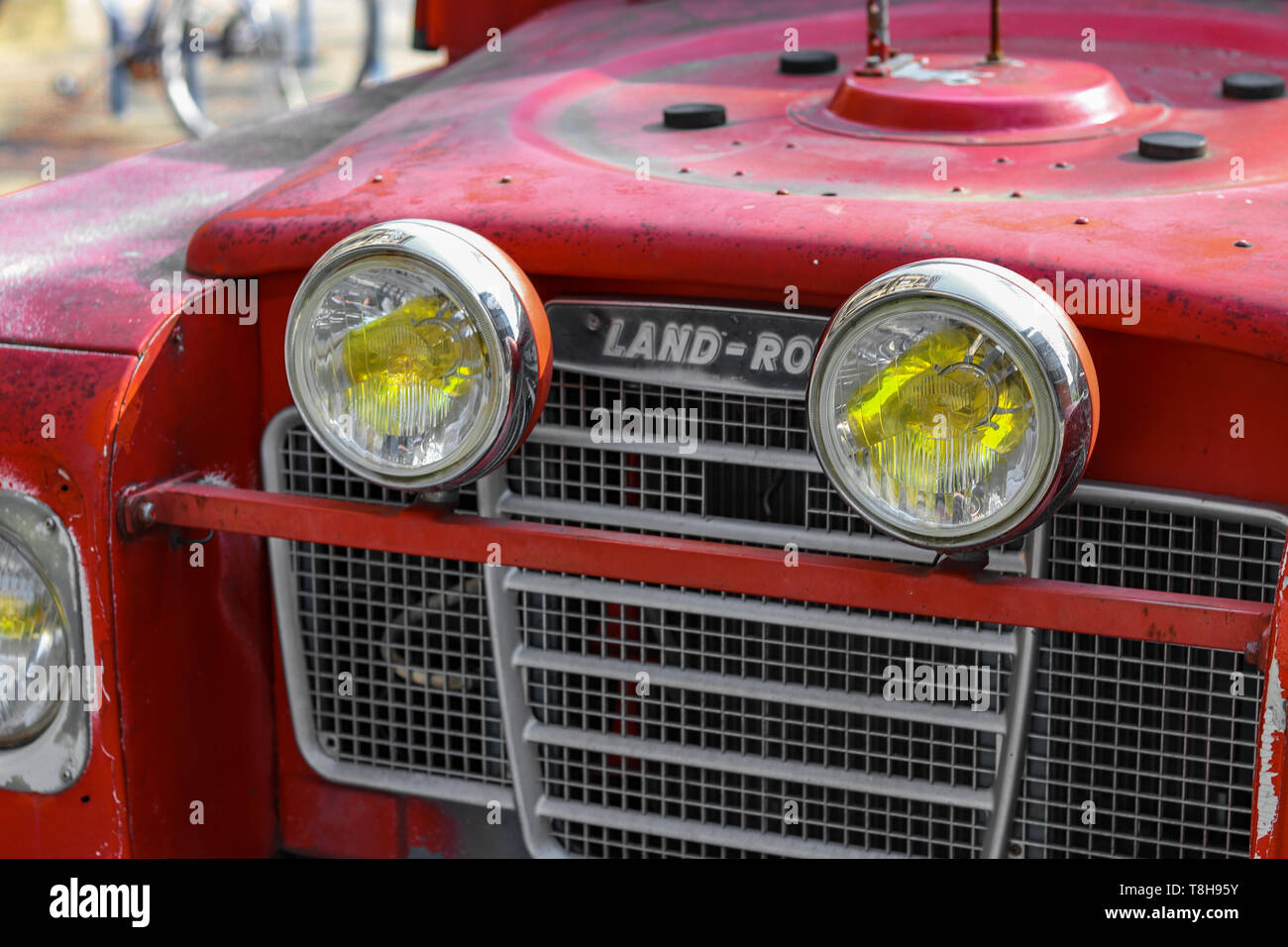 Front of a rusty vintage offroad red car Stock Photo - Alamy