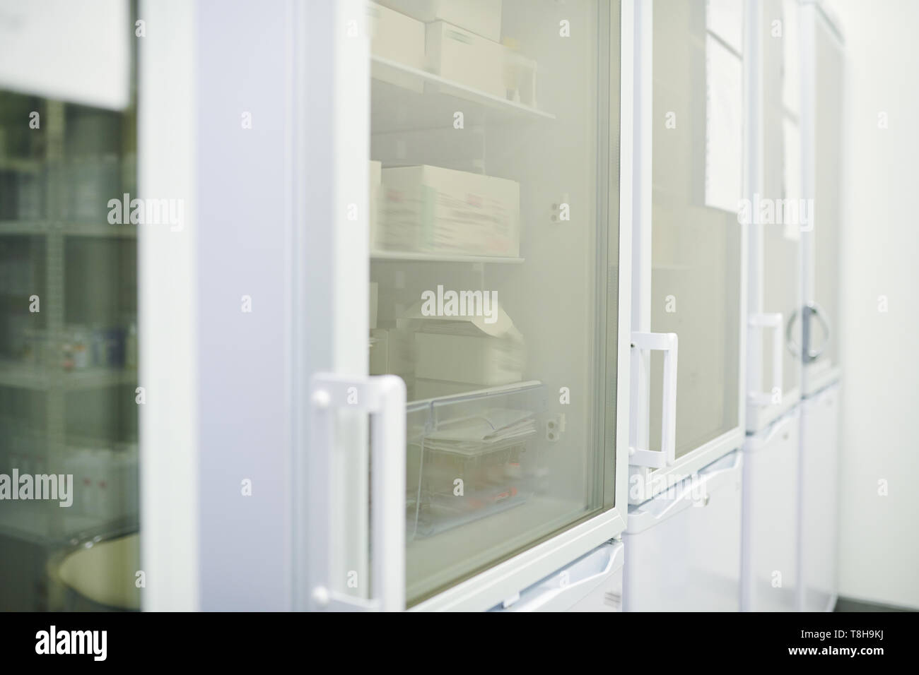 Laboratory cabinets with transparent doors Stock Photo - Alamy