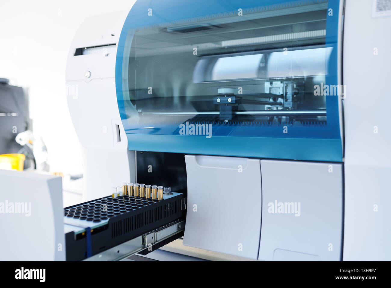 Automatic liquid sampler in laboratory Stock Photo - Alamy