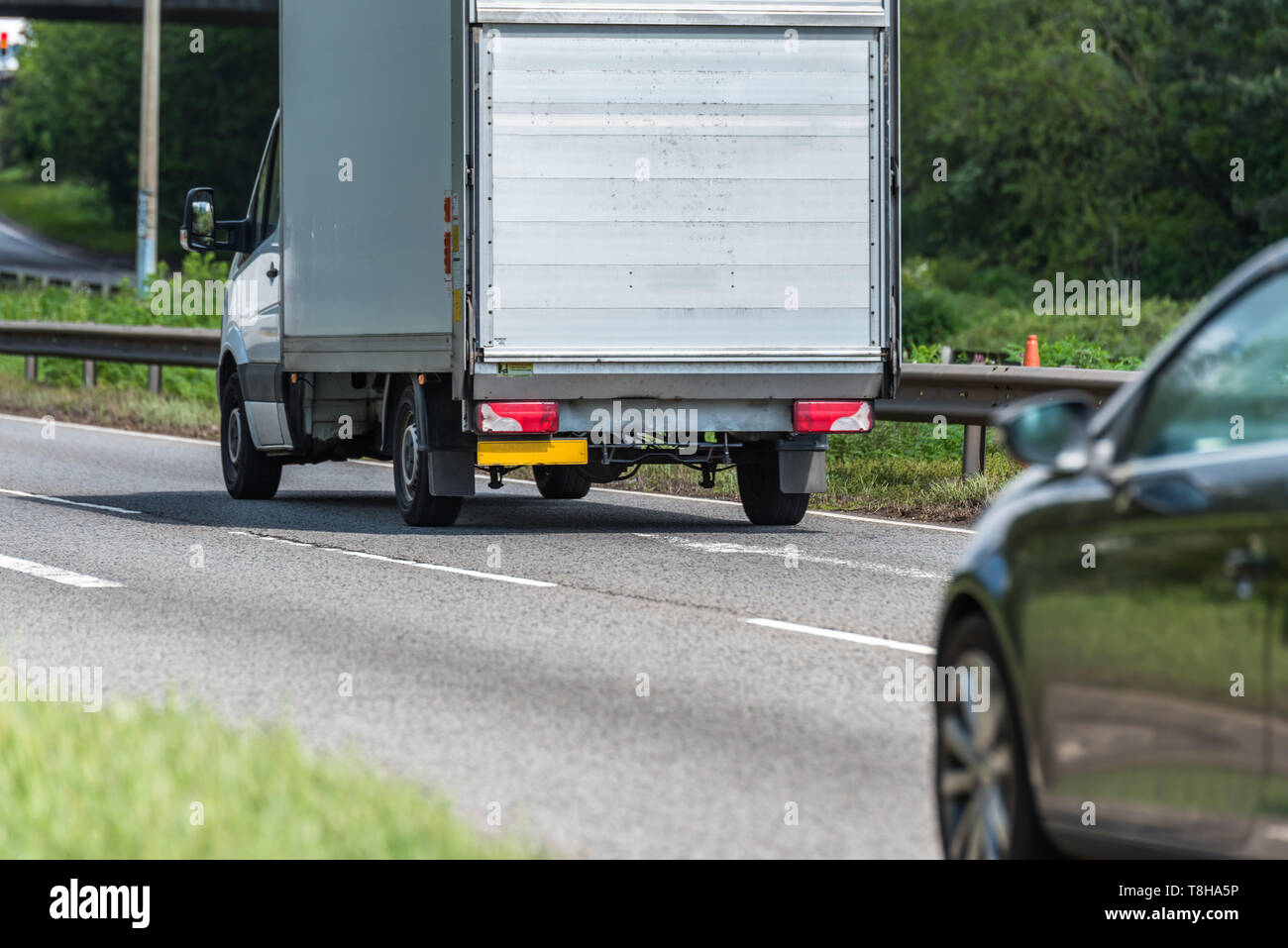 van on uk motorway in fast motion Stock Photo - Alamy