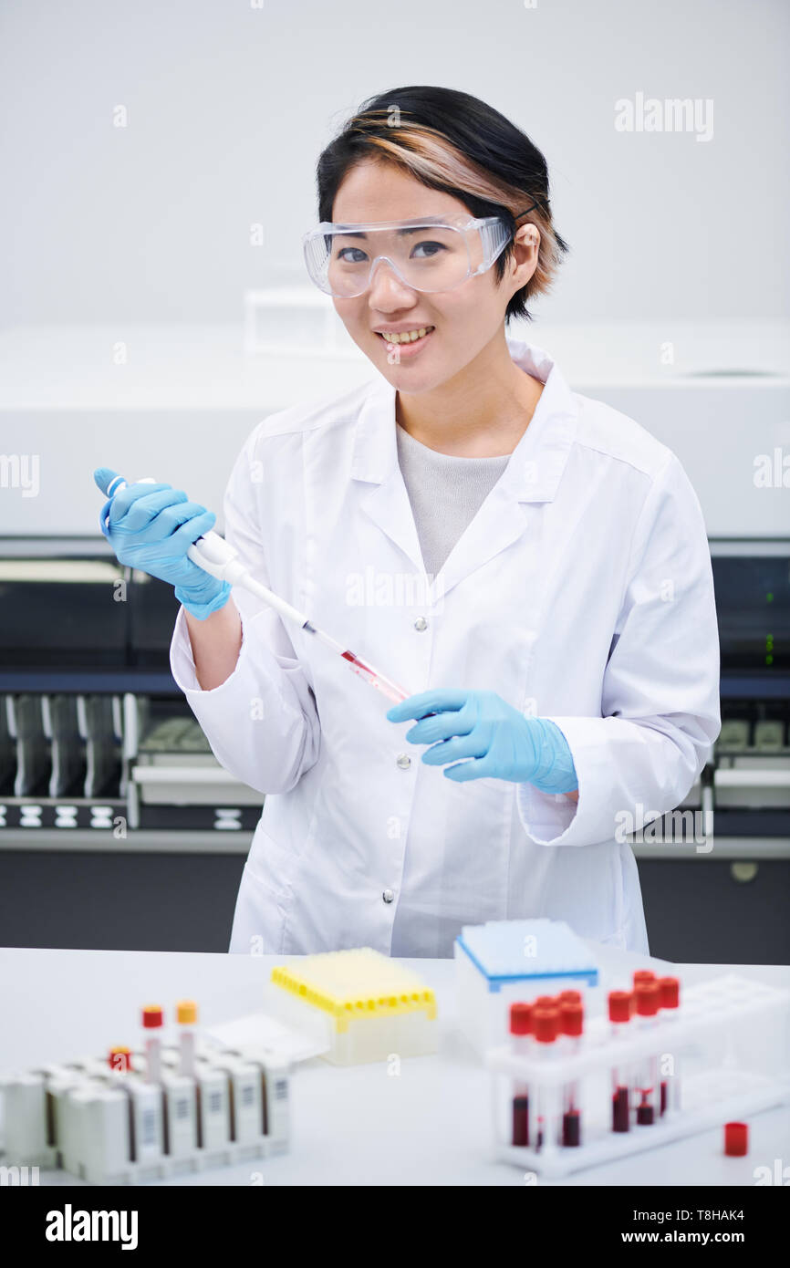 Woman working blood sample hi-res stock photography and images - Alamy