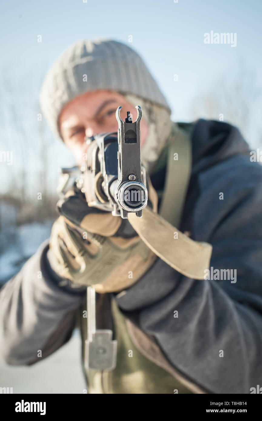 Kalashnikov rifle front view gun point. Direct macro detail close-up of ...