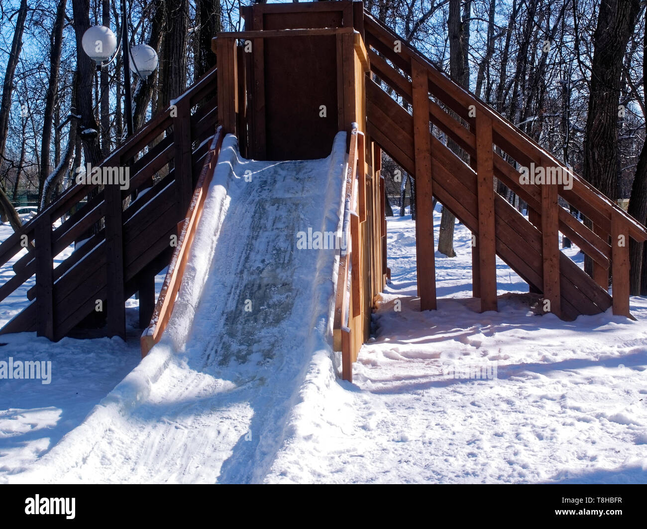 slide for rolling on the Playground in winter, Moscow Stock Photo - Alamy
