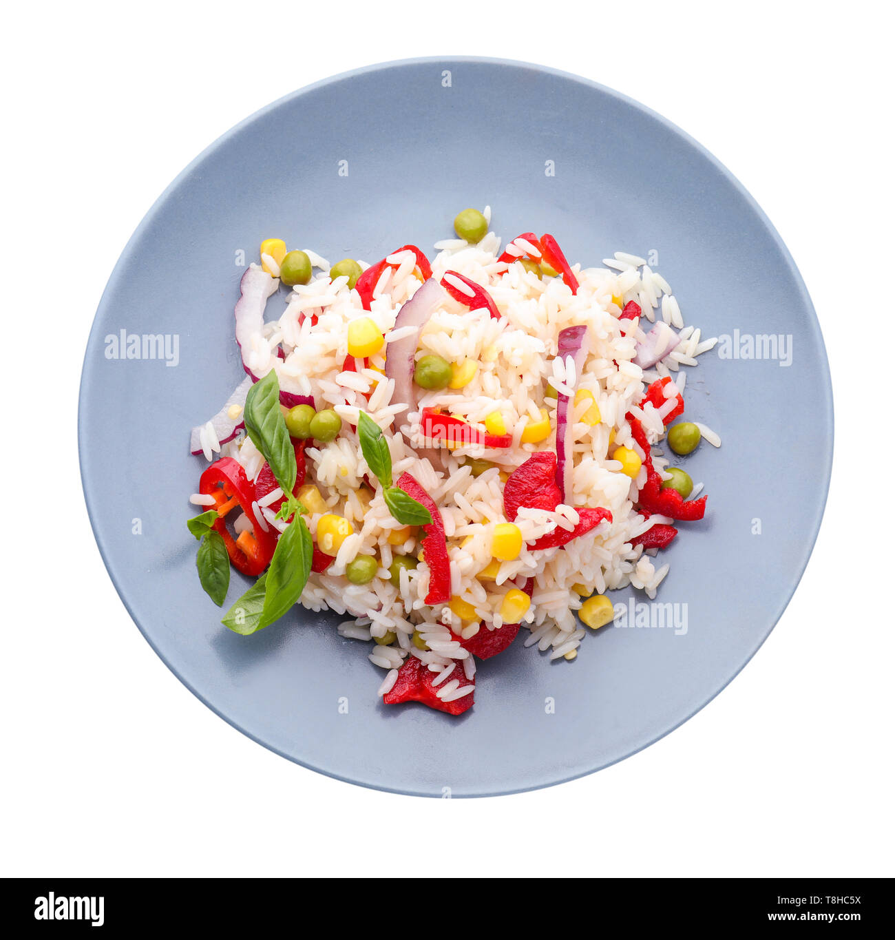 Plate with tasty boiled rice and vegetables on white background Stock ...
