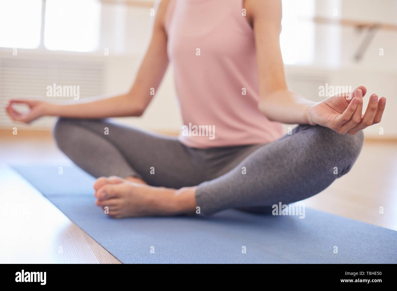 Keeping calm at yoga Stock Photo - Alamy