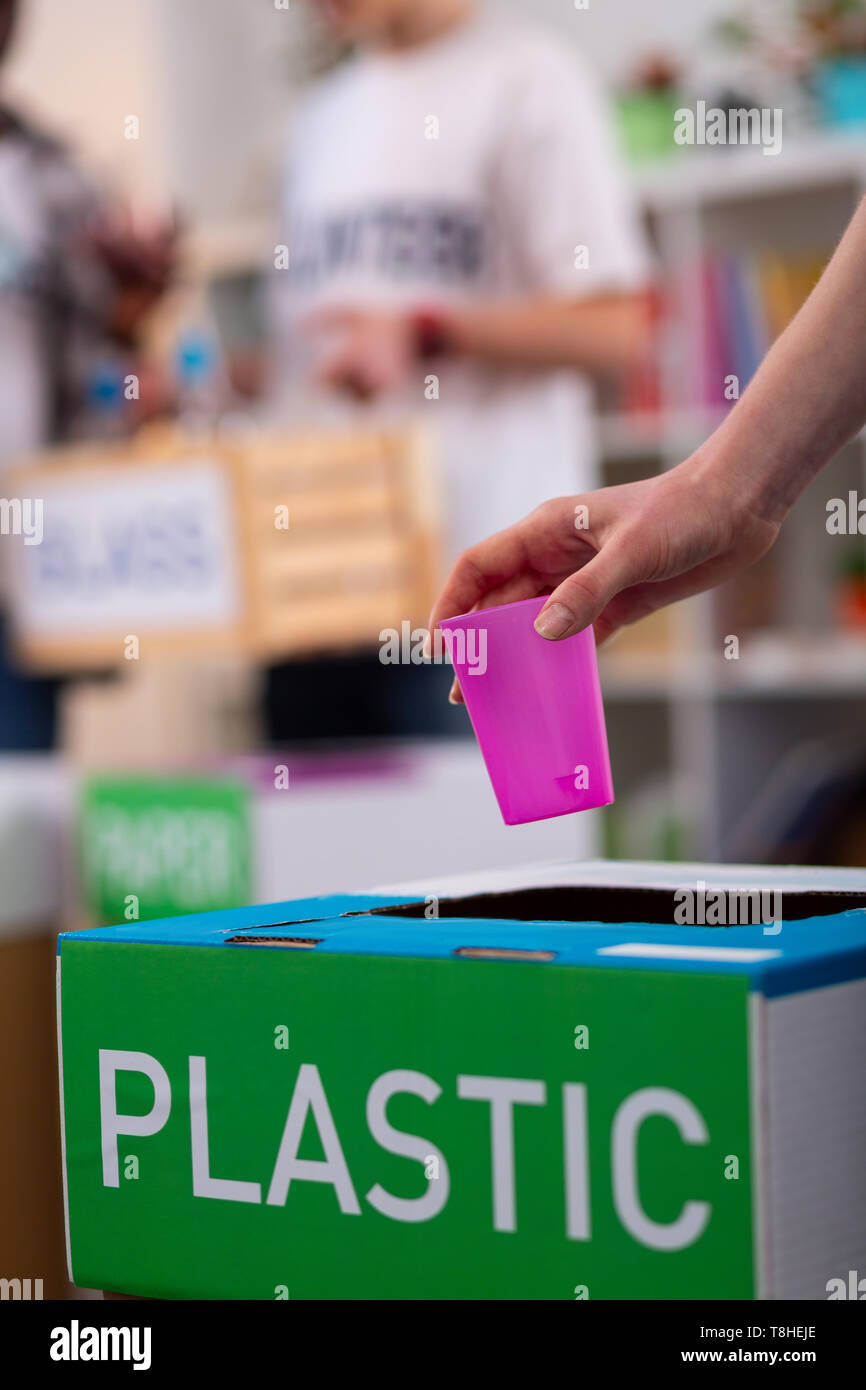 Female hand sorting plastic hi-res stock photography and images - Alamy
