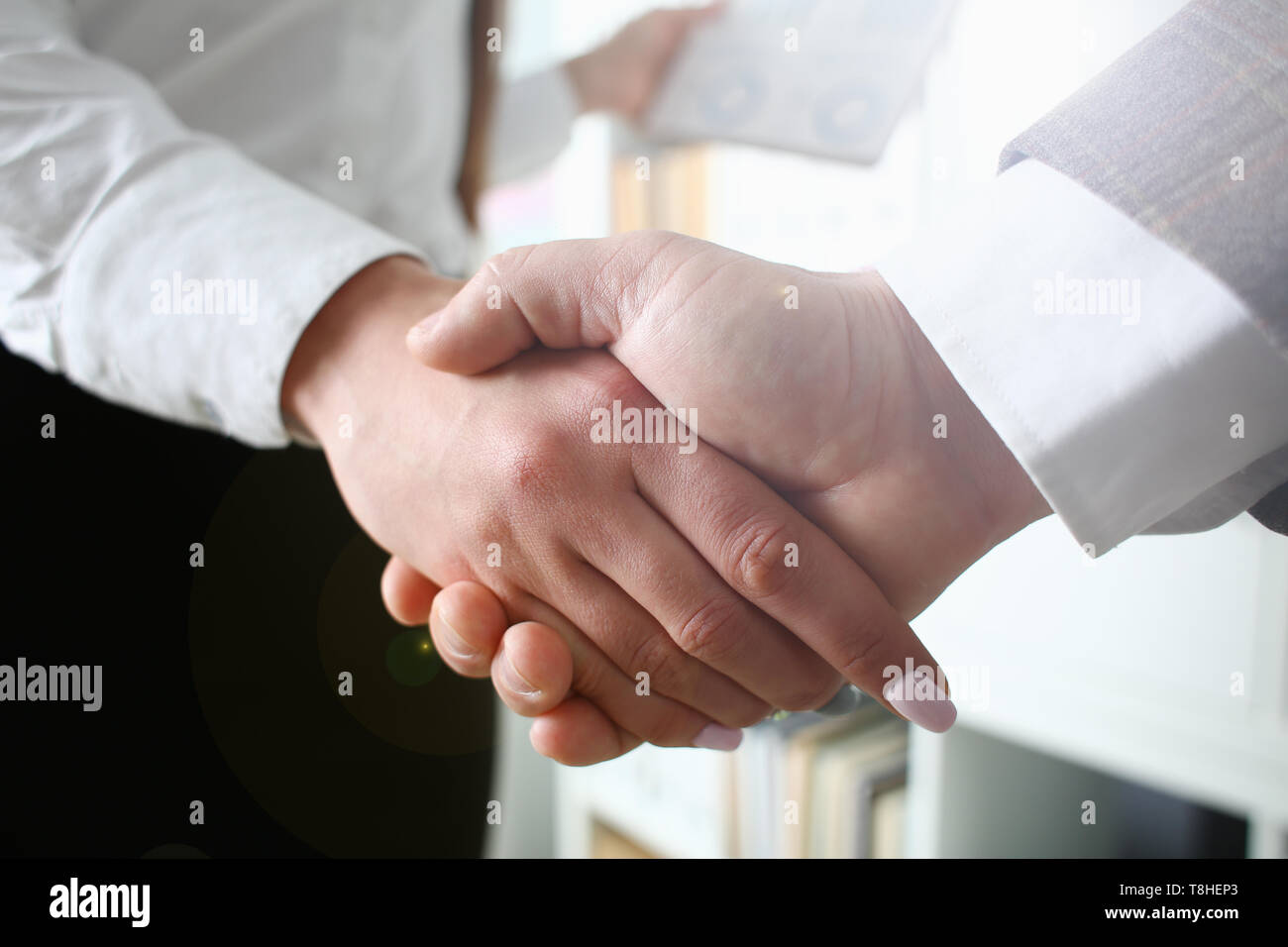 Man in suit and tie give hand as hello in office closeup. Friend ...