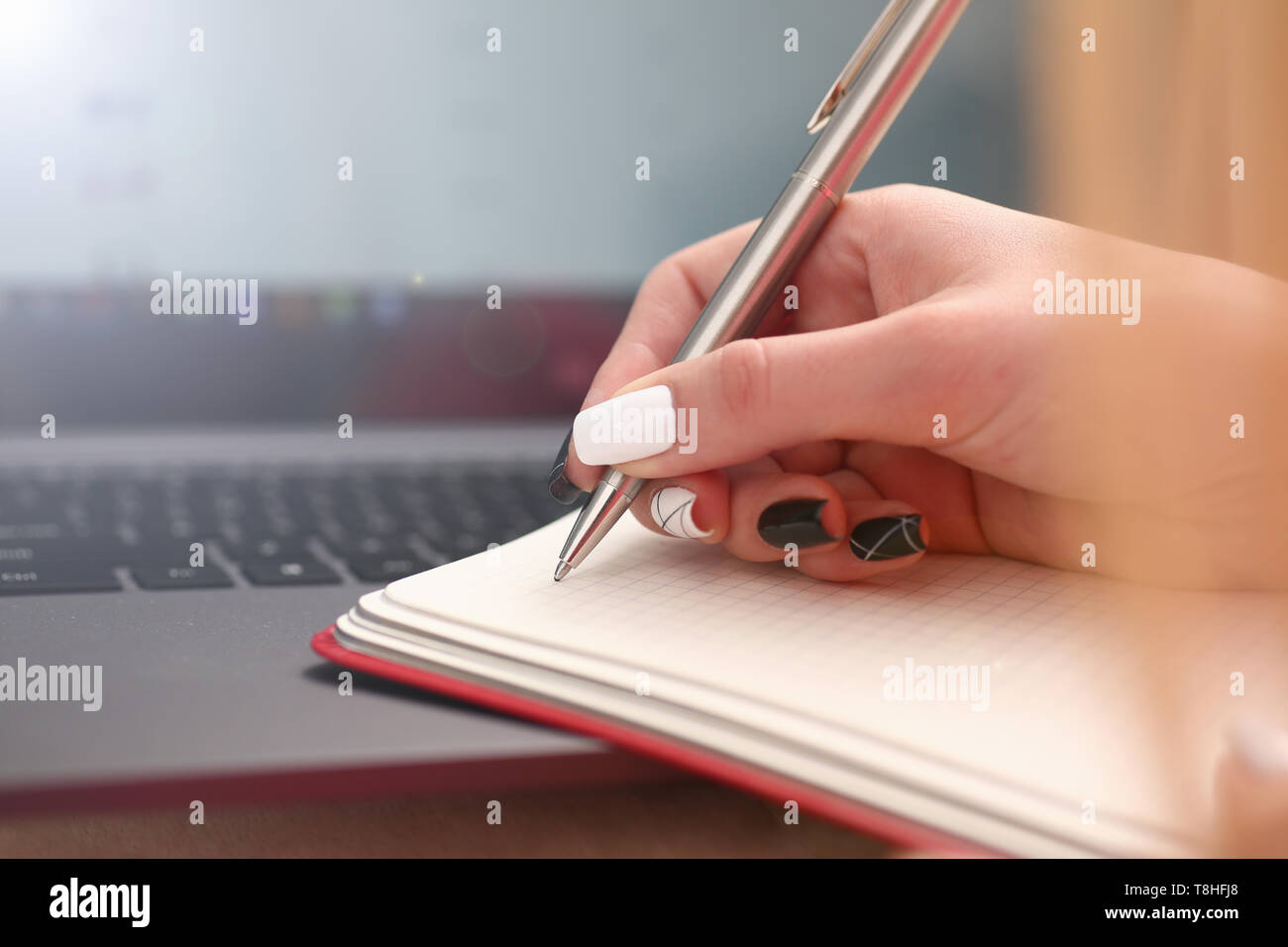 woman study hard write down information to notebook Stock Photo - Alamy