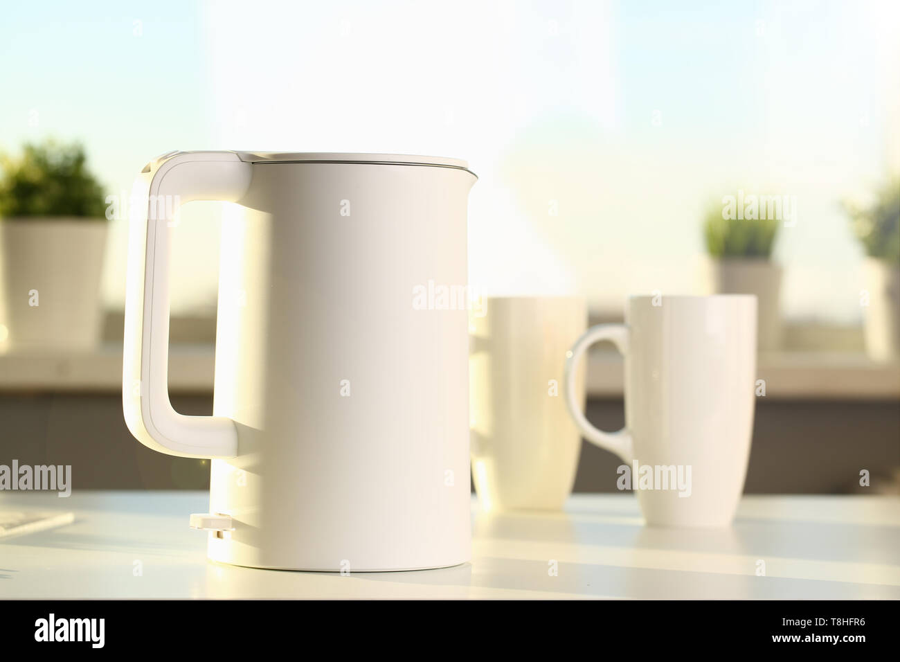 Trendy cups hi-res stock photography and images - Alamy